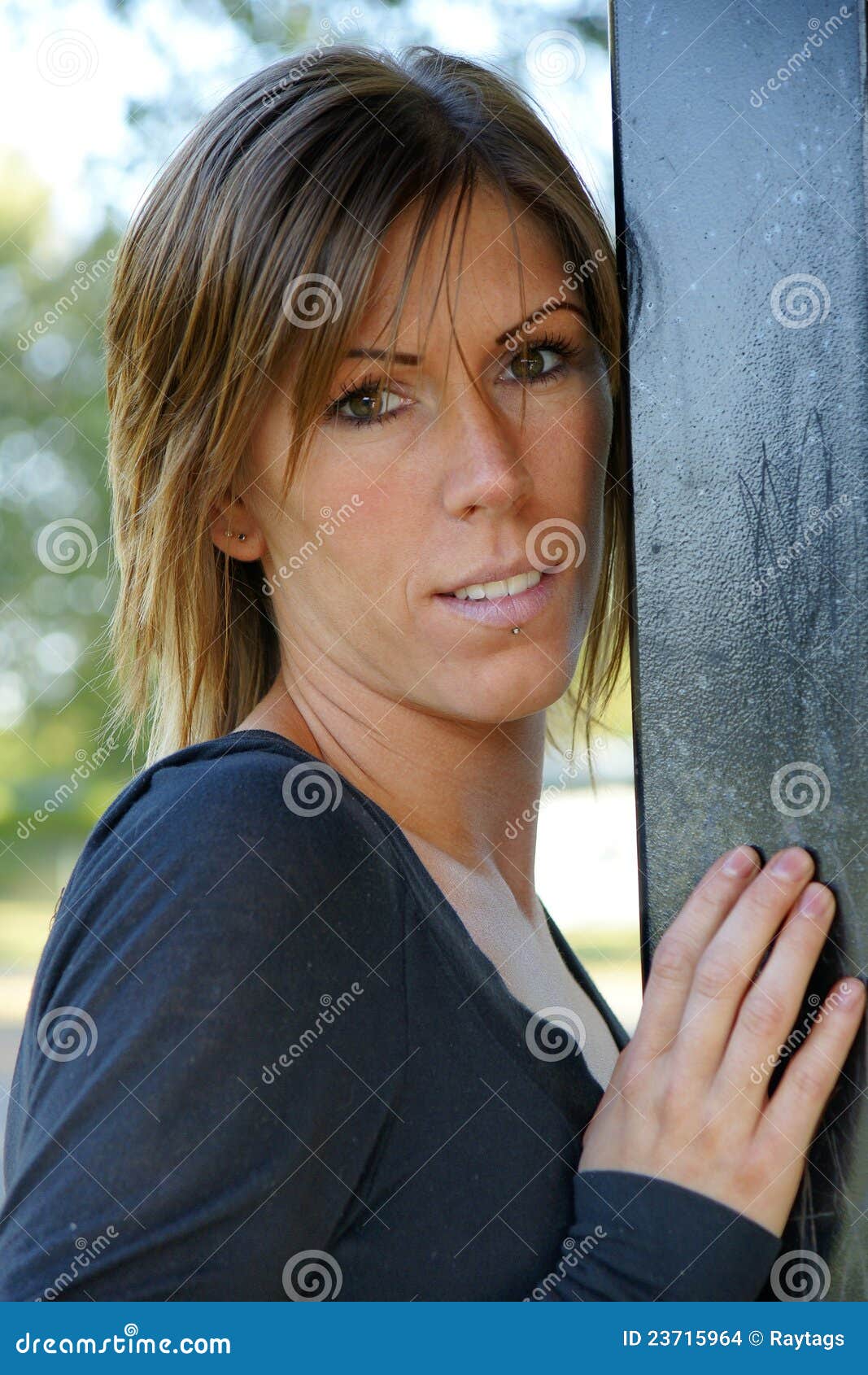 Confident Looking Woman Posing in Front of Camera Stock Photo - Image ...