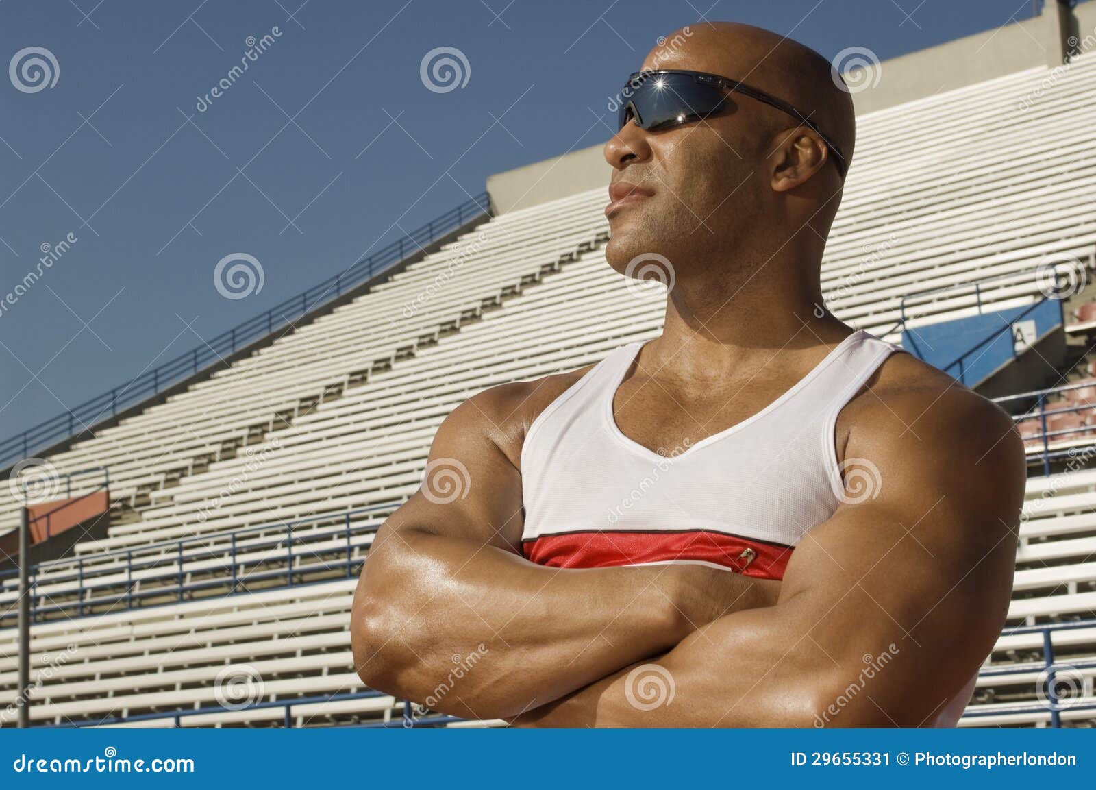 Confident Male Athlete Looking Away Stock Image - Image of crossed ...