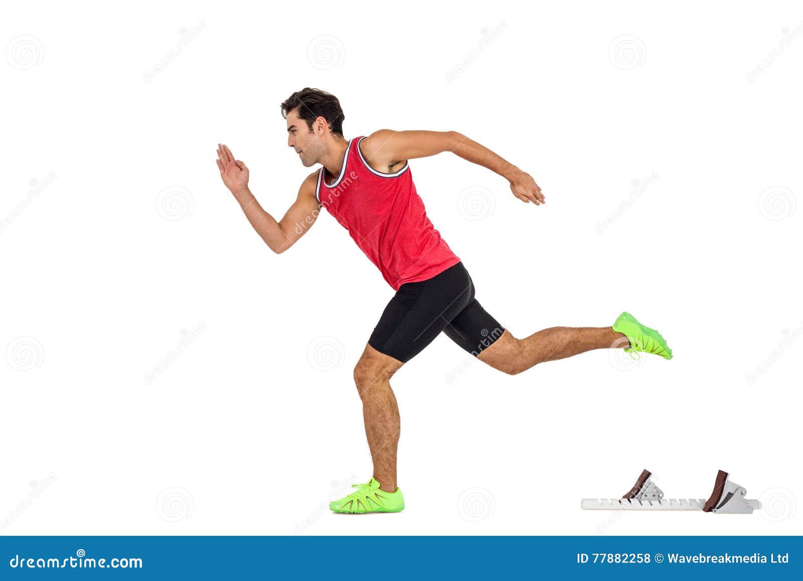 Confident Male Athlete Running from Starting Blocks Stock Photo - Image ...