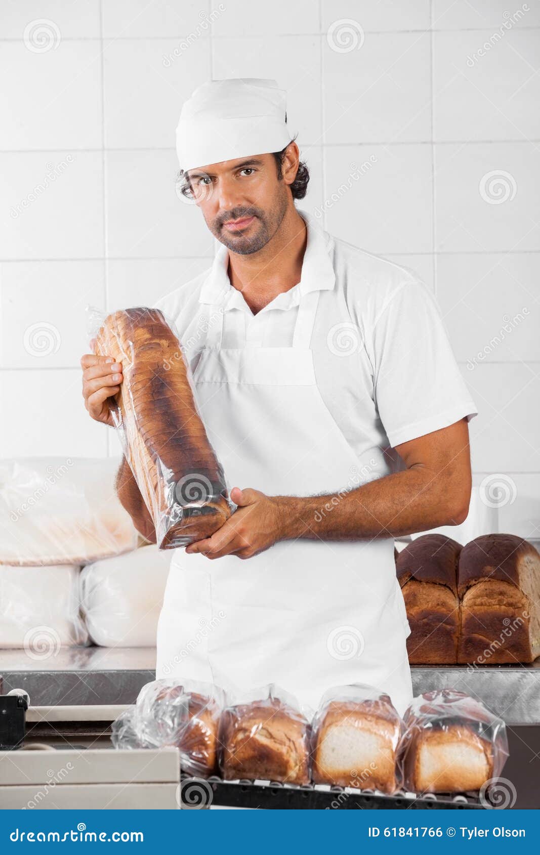 Confident Male Baker Showing Packed Breads Stock Photo - Image of male ...