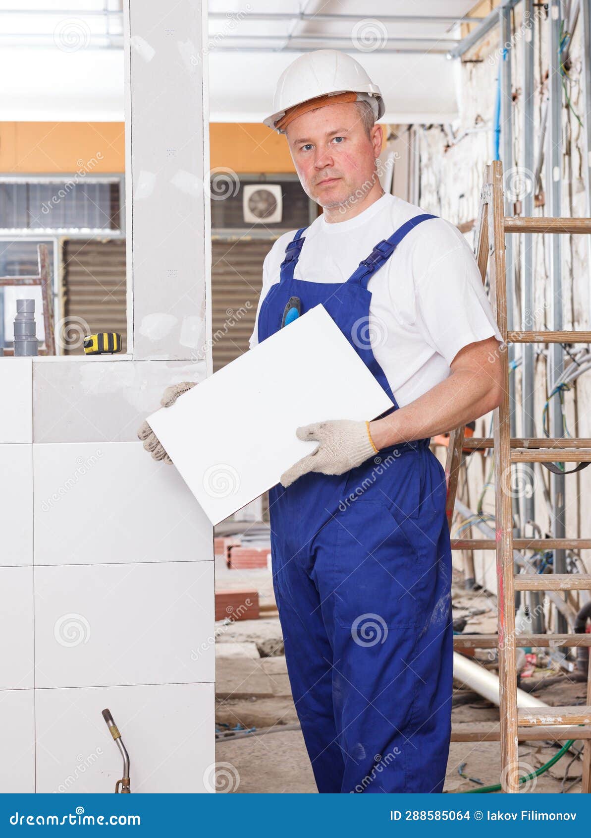 Contractor Installing Ceramic Tile Stock Photo - Image of installing ...