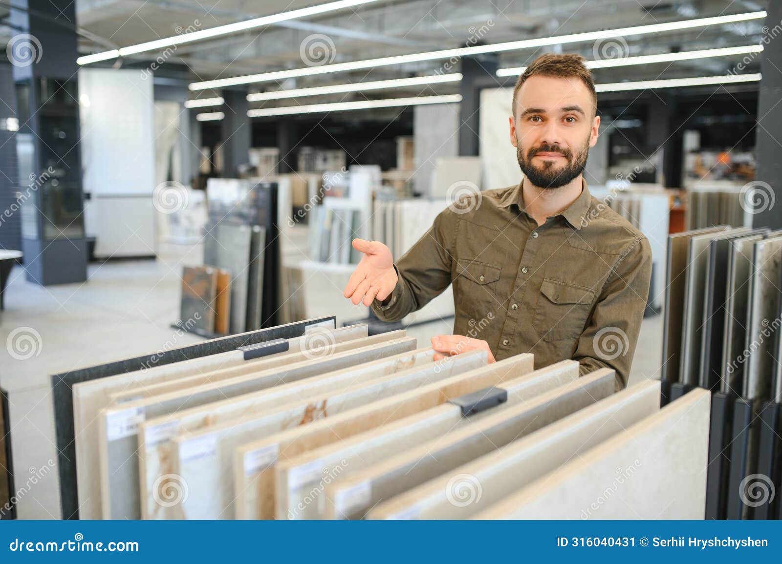 Confident Male Customer Picking Out Wall Tile Materials for Bathroom in ...