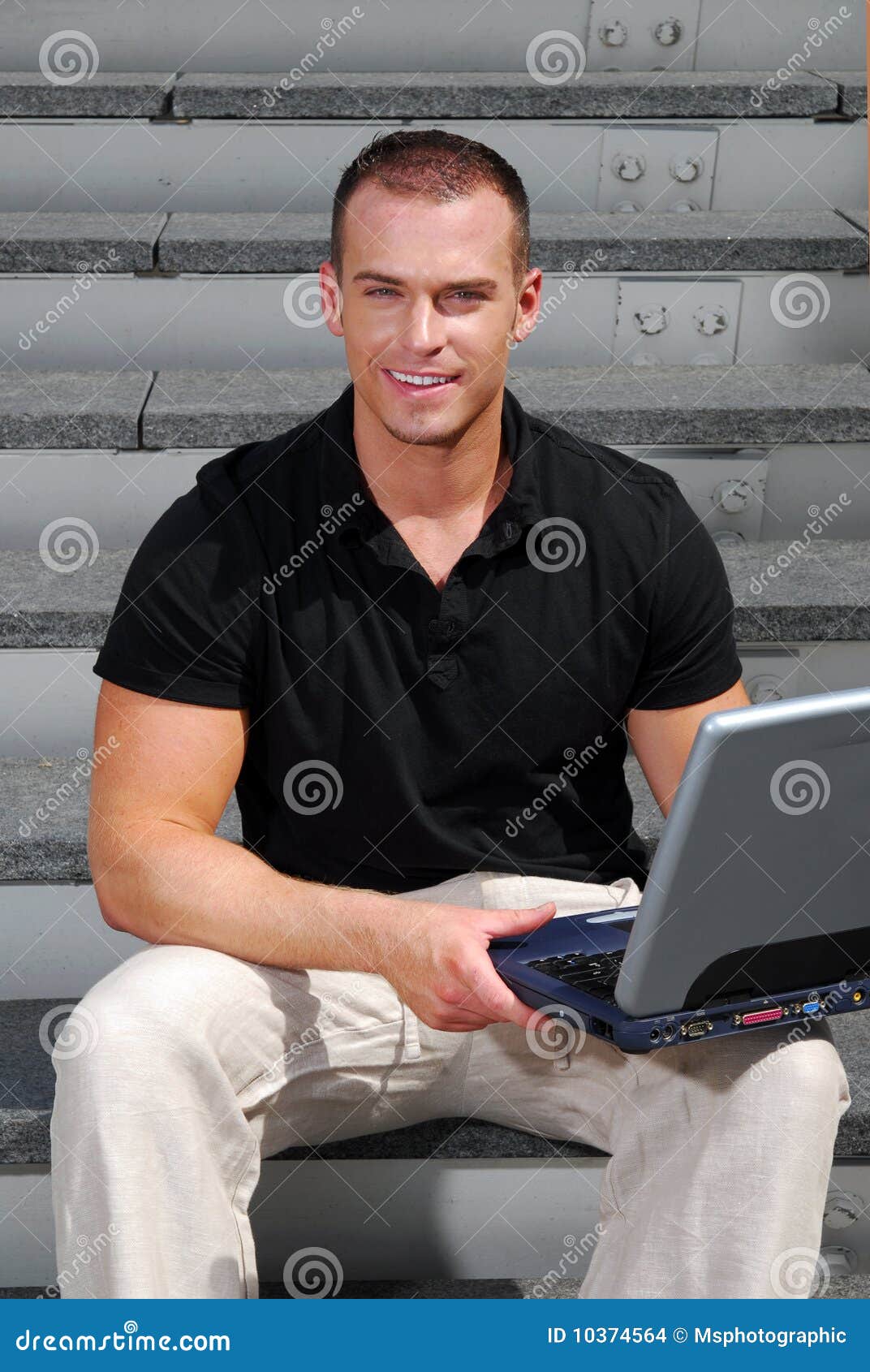 Confident Man with Laptop Computer Stock Photo - Image of smiling ...