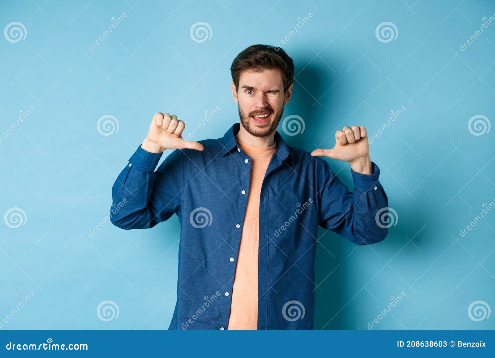 Confident Man Winking and Pointing at Himself, Self-promoting, Standing ...