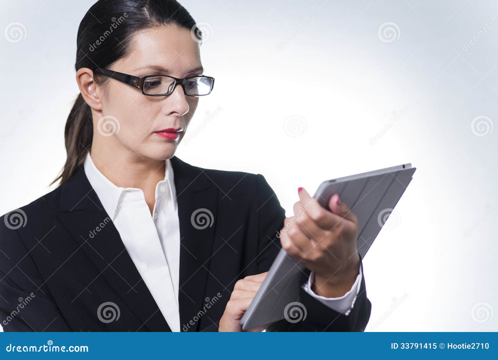 Confident Manageress Working on a Tablet Stock Image - Image of tablet ...