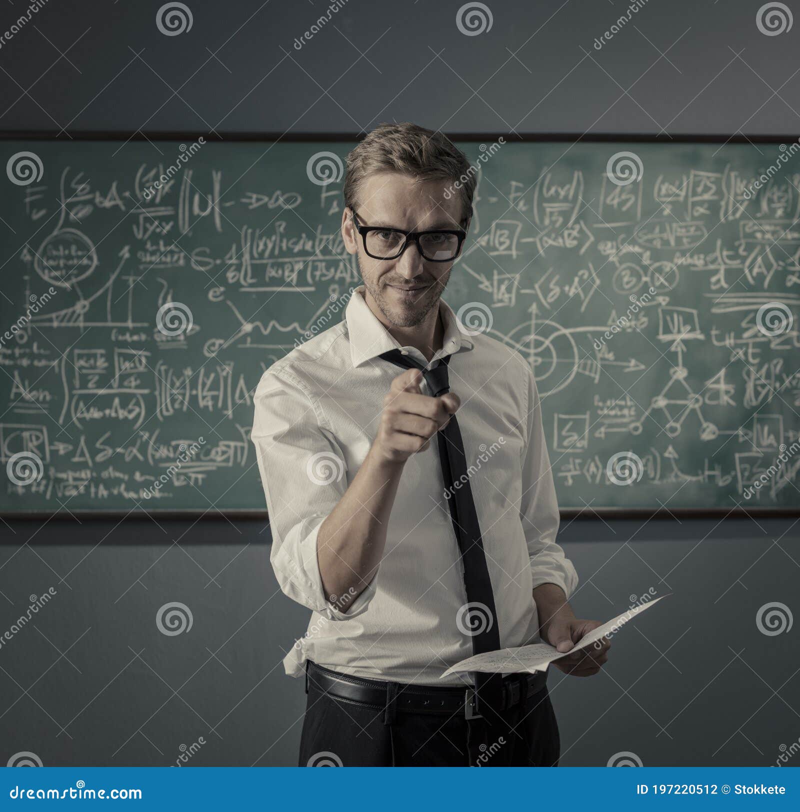 Confident Math Professor Pointing at Camera Stock Photo - Image of ...