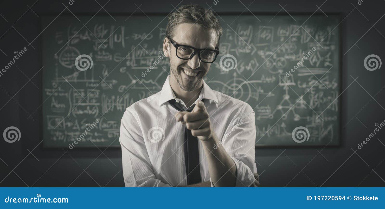 Confident Math Professor Pointing at Camera Stock Photo - Image of ...
