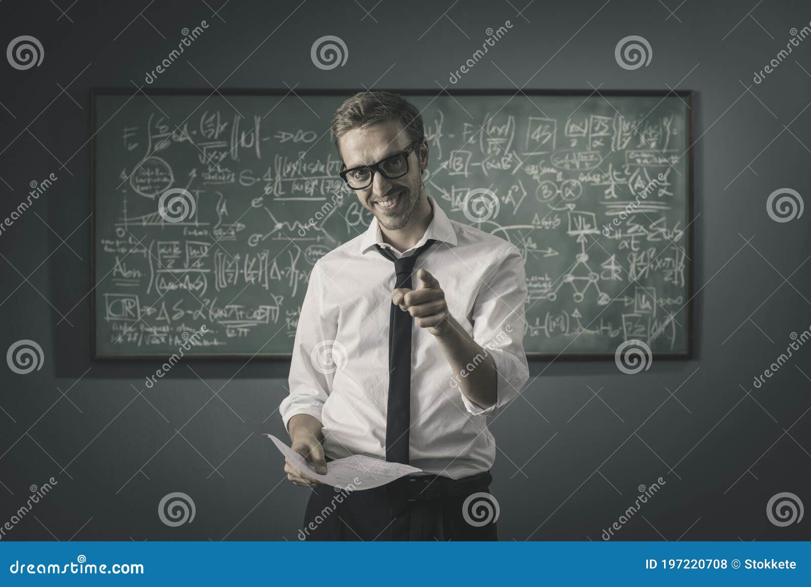 Confident Math Professor Pointing at Camera Stock Photo - Image of ...