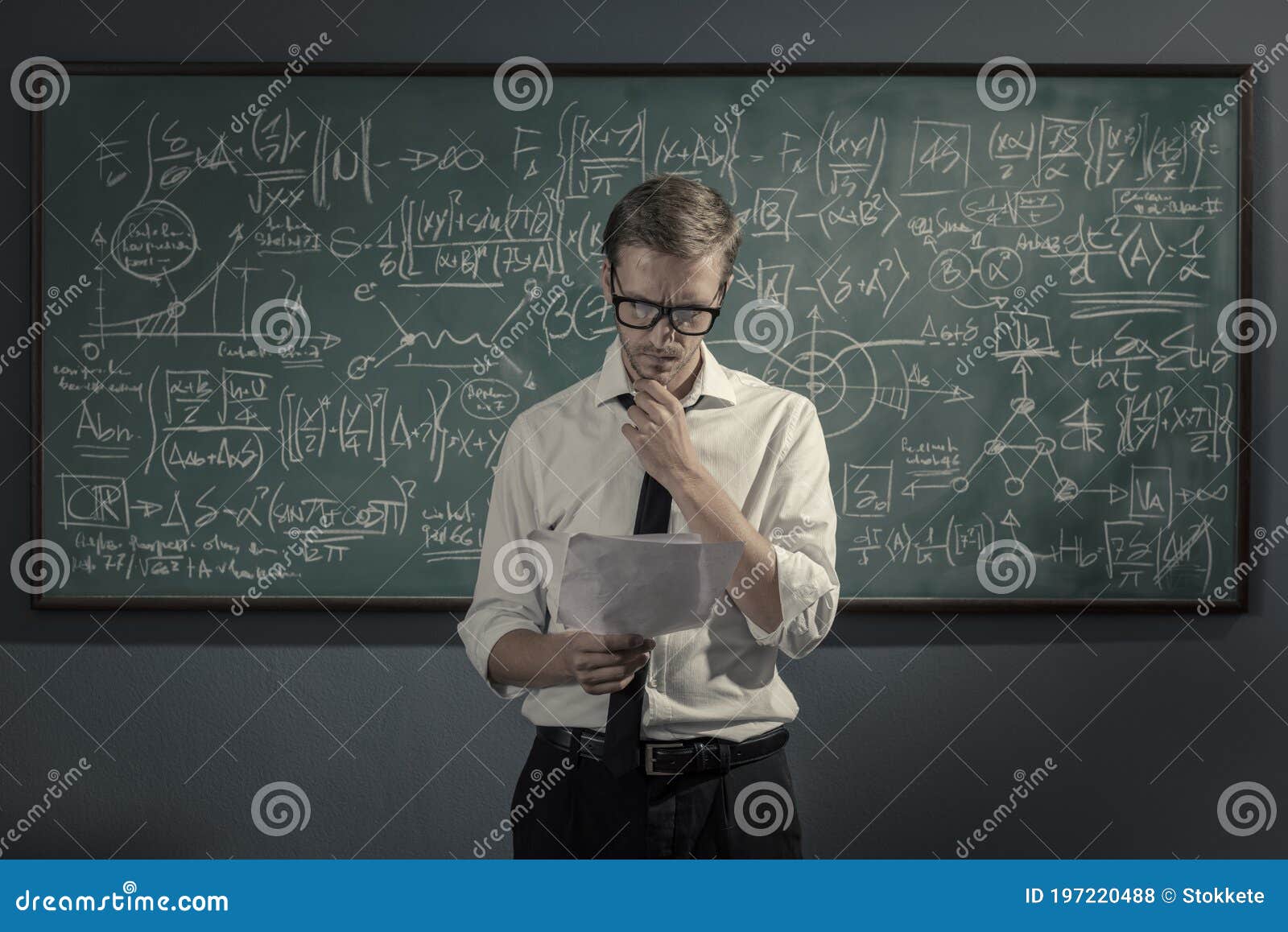 Confident Math Professor Teaching in Front of the Chalkboard Stock ...