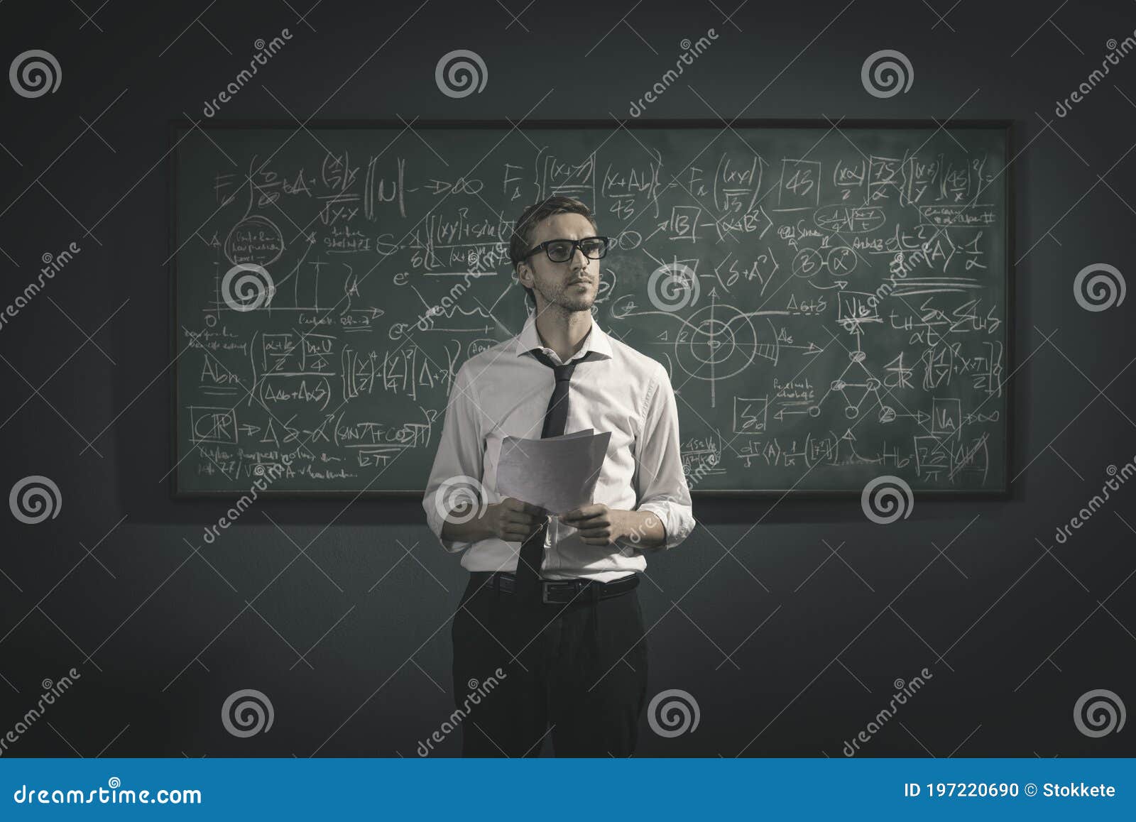 Confident Math Professor Teaching in Front of the Chalkboard Stock ...