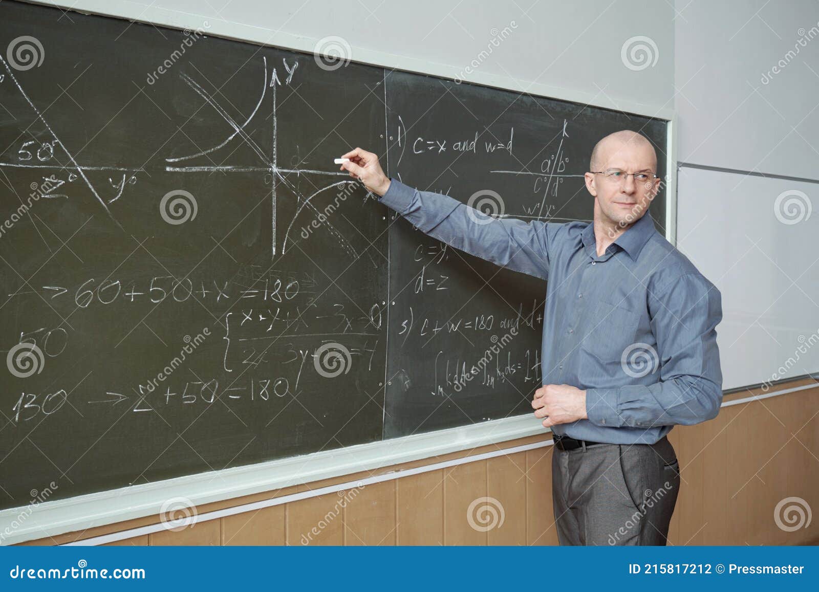 Confident Mature Professor Standing in Front of Blackboard in Lecture ...