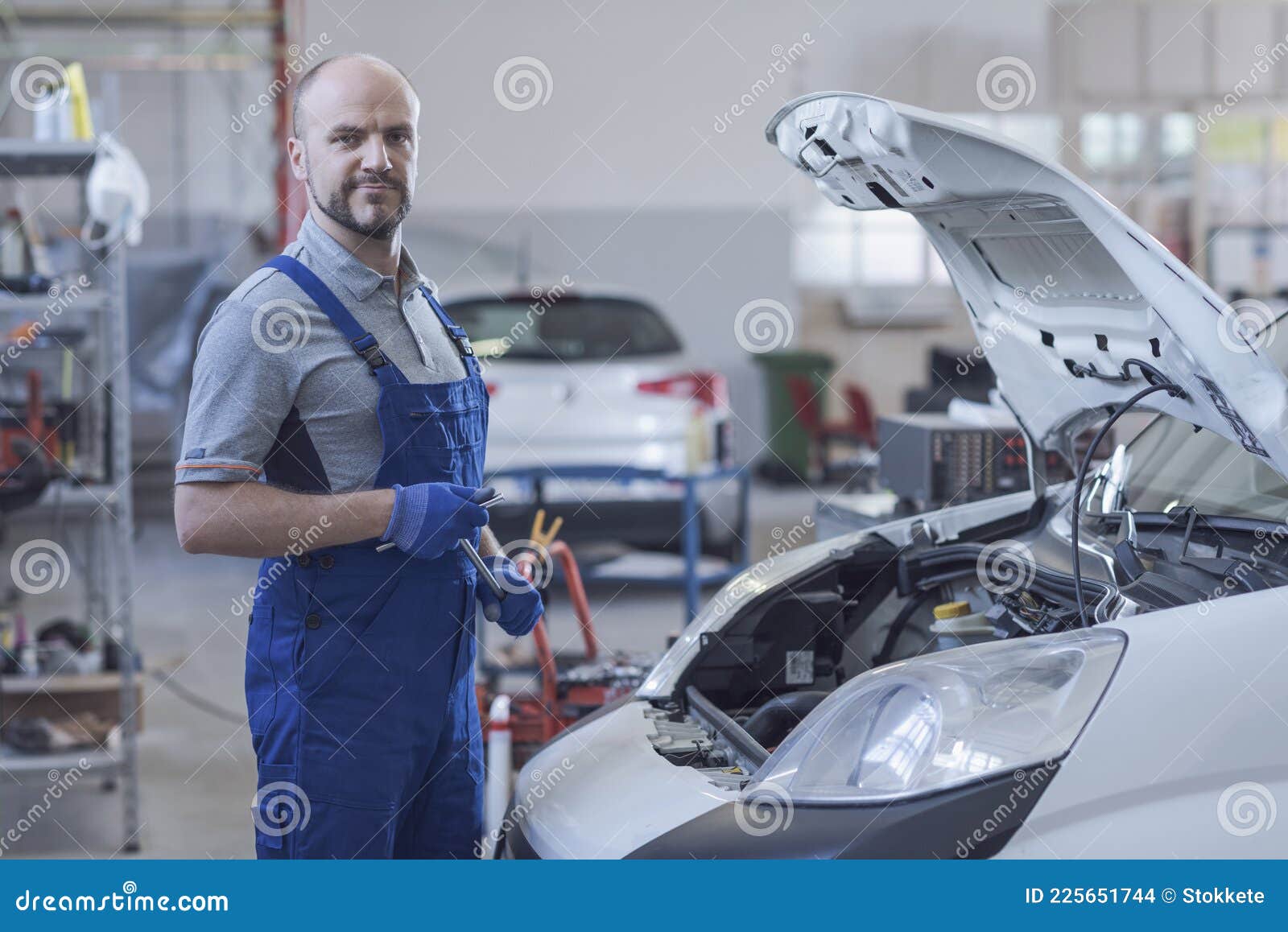 Confident Mechanic Posing in the Garage Stock Photo - Image of ...
