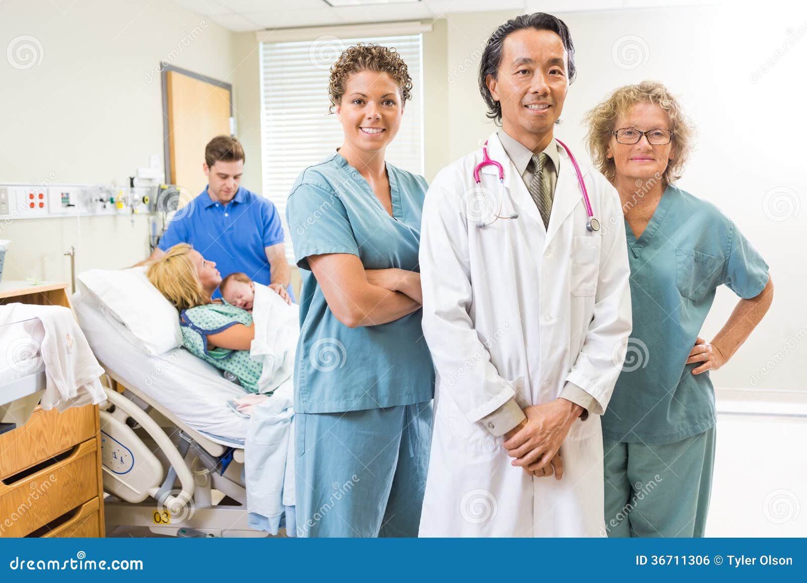 Confident Medical Team With Newborn Baby And Stock Photo - Image of ... Confident Medical Team With Newborn Baby And Stock Photo - Image of ...