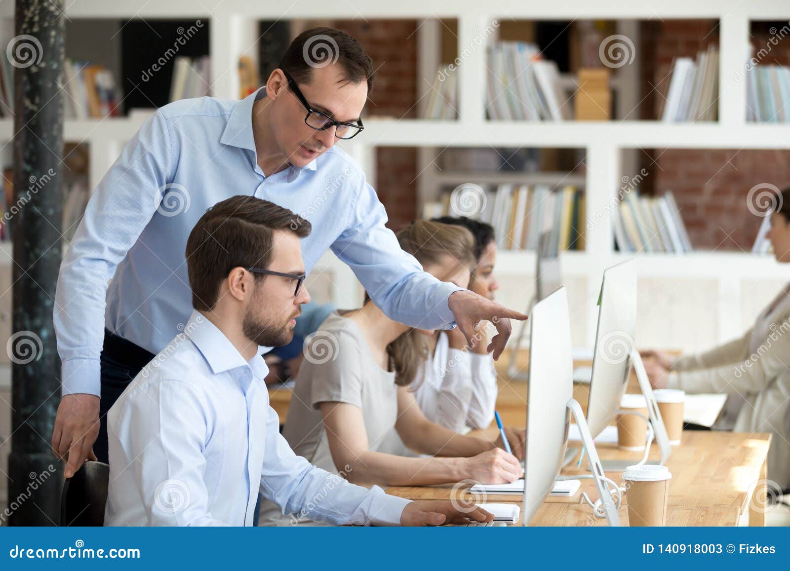 Confident Mentor Help Trainee Understand Corporate Program Stock Image ...