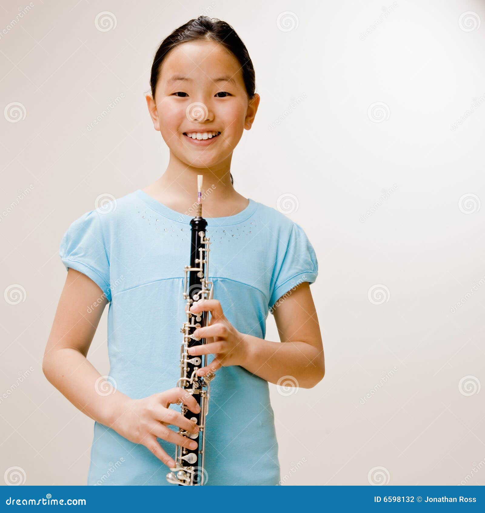 Confident Musician Holding Clarinet Stock Photo - Image of portraiture ...