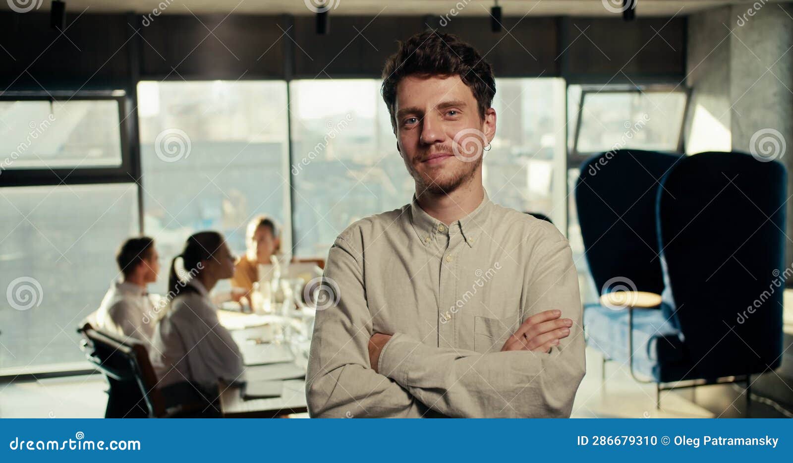 Confident Office Worker in a White Shirt Folded His Arms on His Chest ...