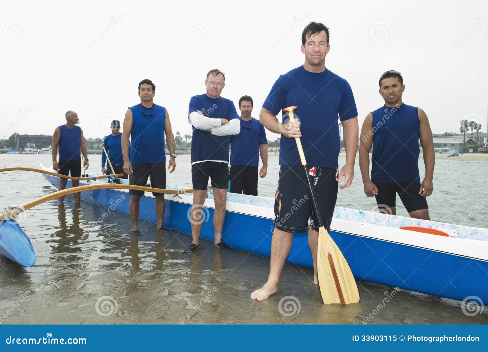 Confident Outrigger Canoeing Team Stock Image - Image of people, happy ...