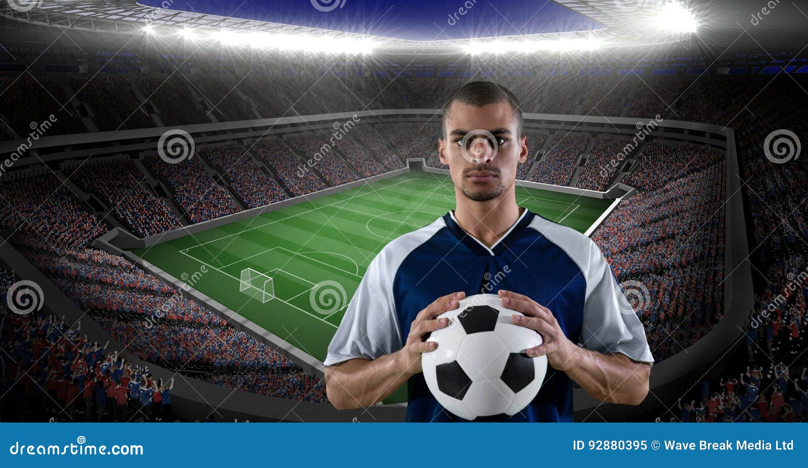 Confident Player Holding Soccer Ball Against Stadium Stock Image ...