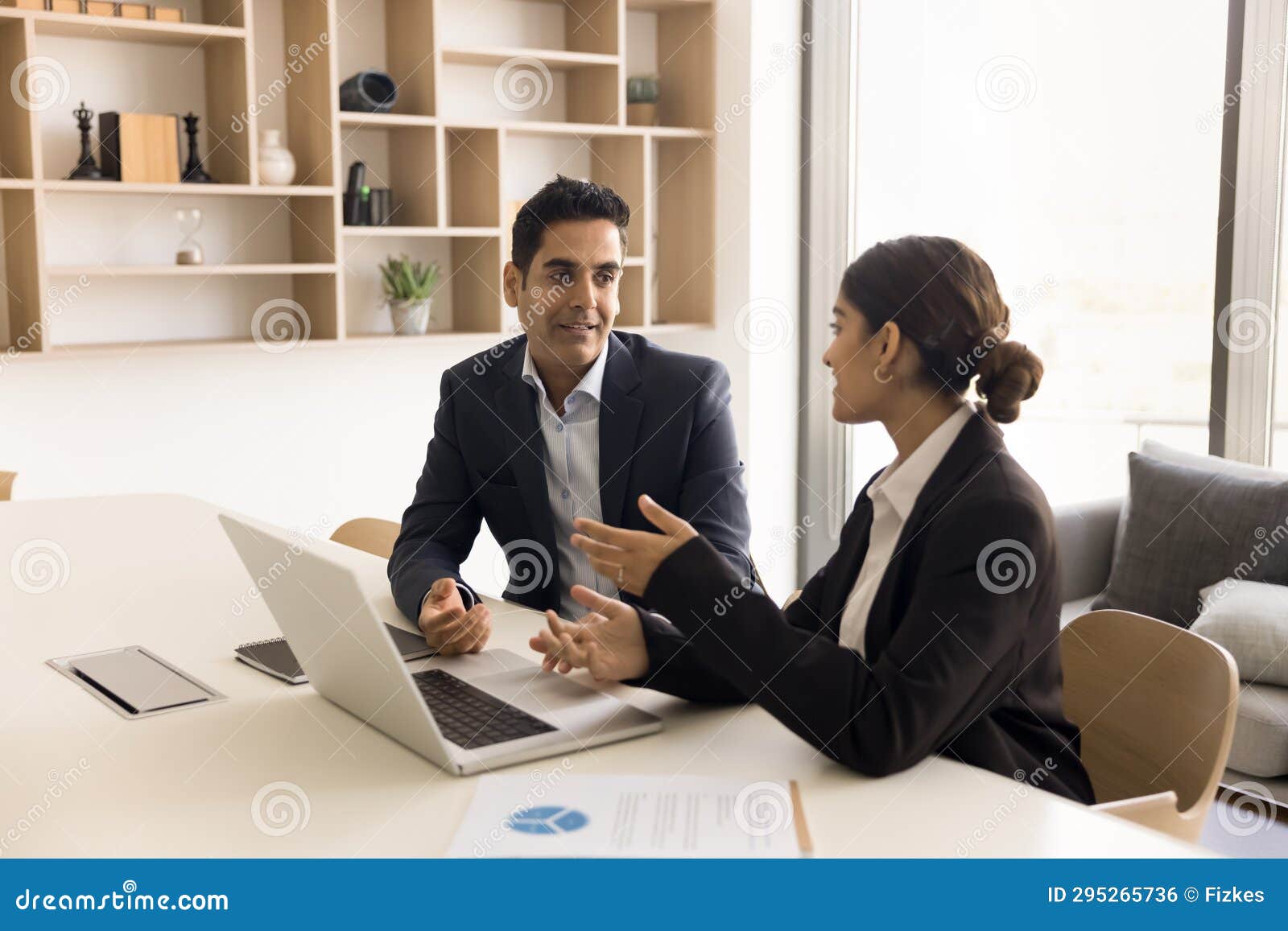 Confident Positive Indian Client and Developer Discussing Online ...