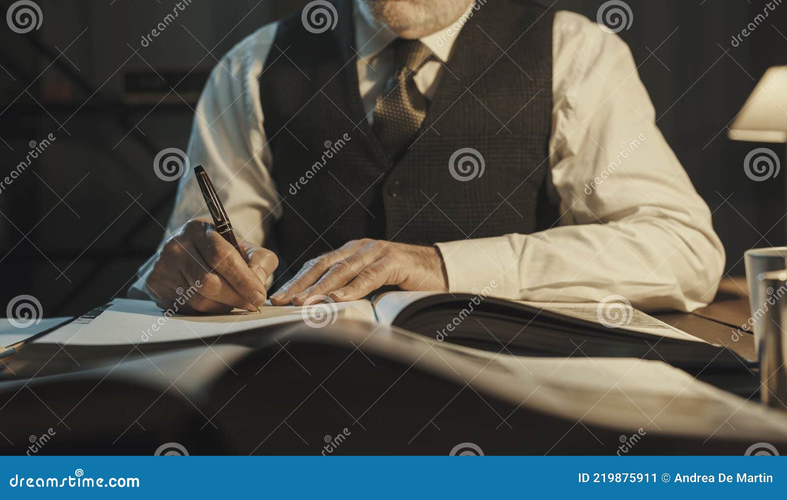 Academic Professor Writing Down Notes and Reading a Book Stock Image ...