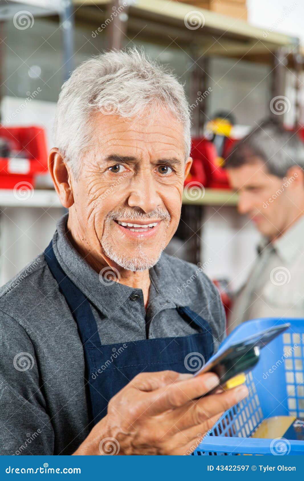 Confident Senior Salesman Holding Tool in Store Stock Image - Image of ...