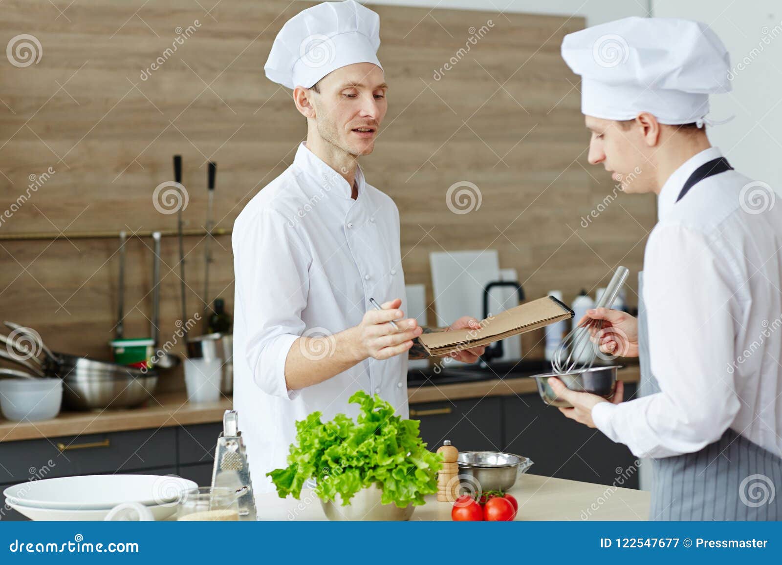 Skilled Chef Teaching Intern at Cooking Class Stock Image - Image of ...