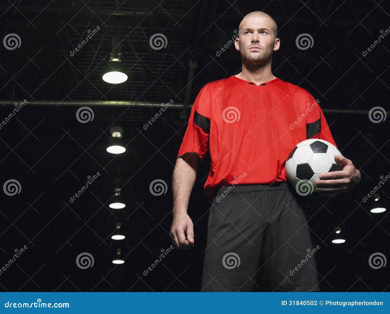 Confident Soccer Player Holding Ball Stock Photo - Image of practise ...