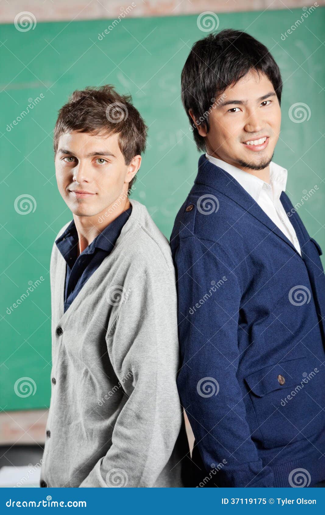Confident Students Standing in Classroom Stock Image - Image of ...