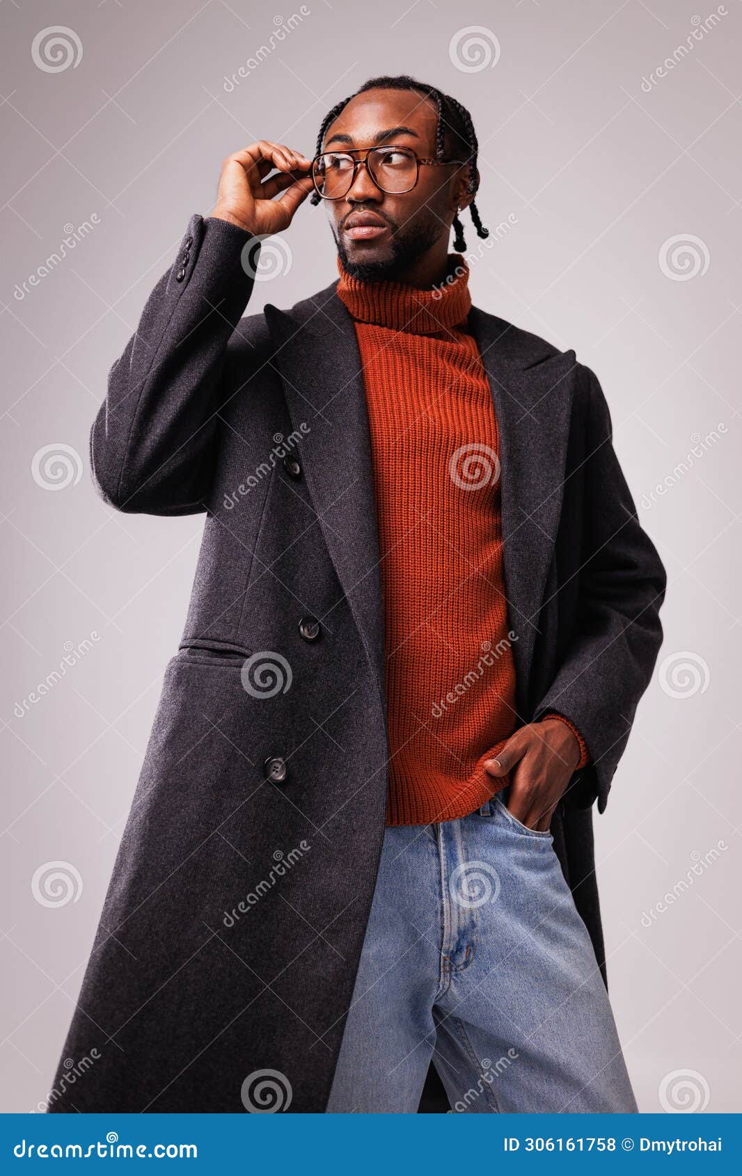 Confident And Stylish African American Man Holding Eyeglasses While