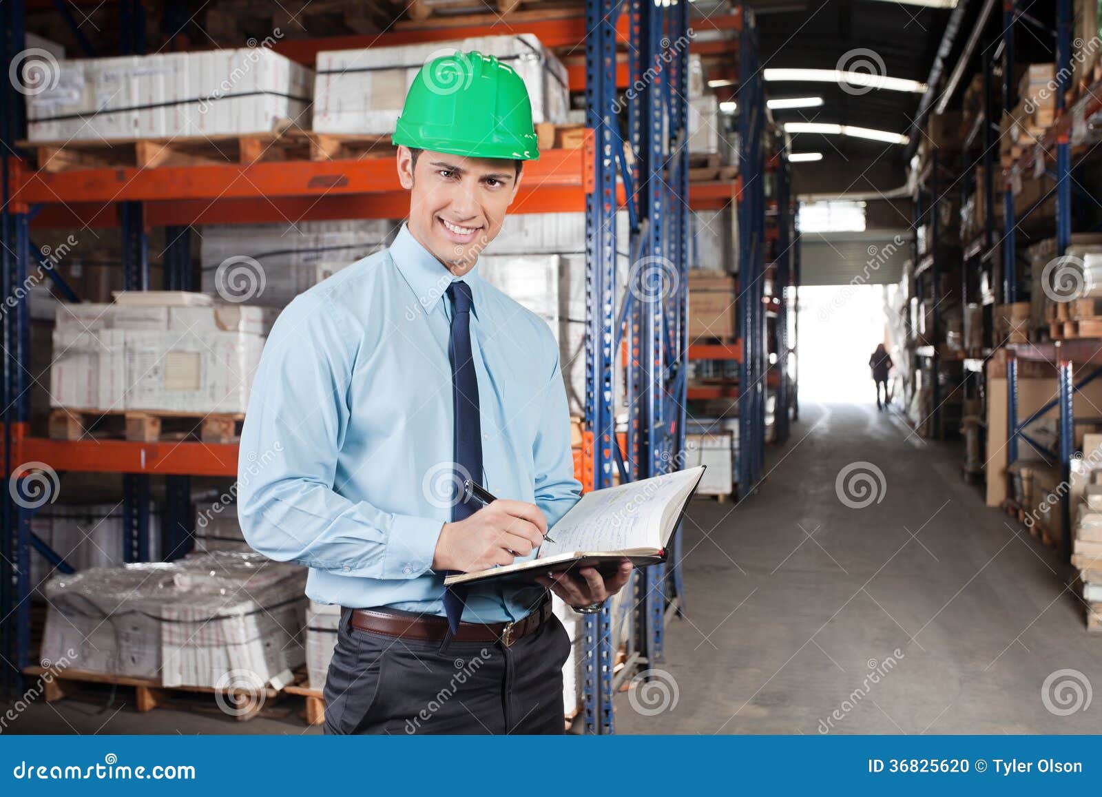 Confident Supervisor with Book at Warehouse Stock Photo - Image of ...