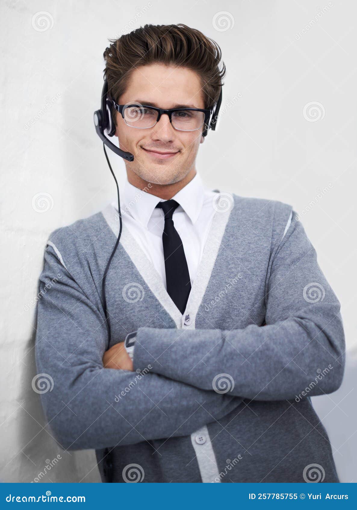 Confident Support Assistant. a Young Technical Support Engineer Leaning ...