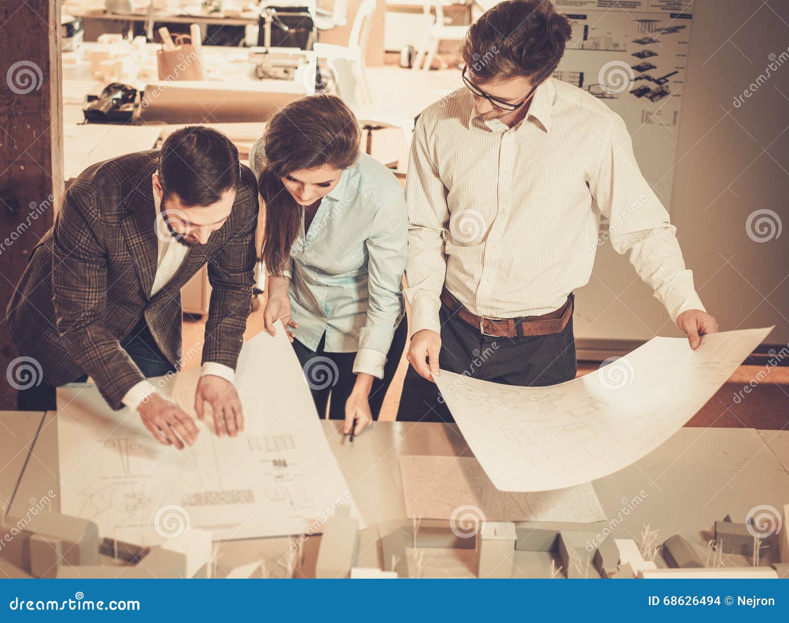 Confident Team of Engineers Working Together in a Architect Studio ...