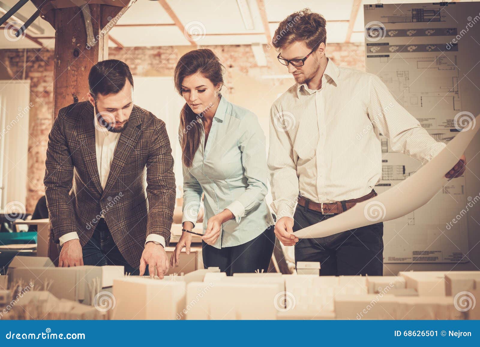 Confident Team of Engineers Working Together in a Architect Studio ...