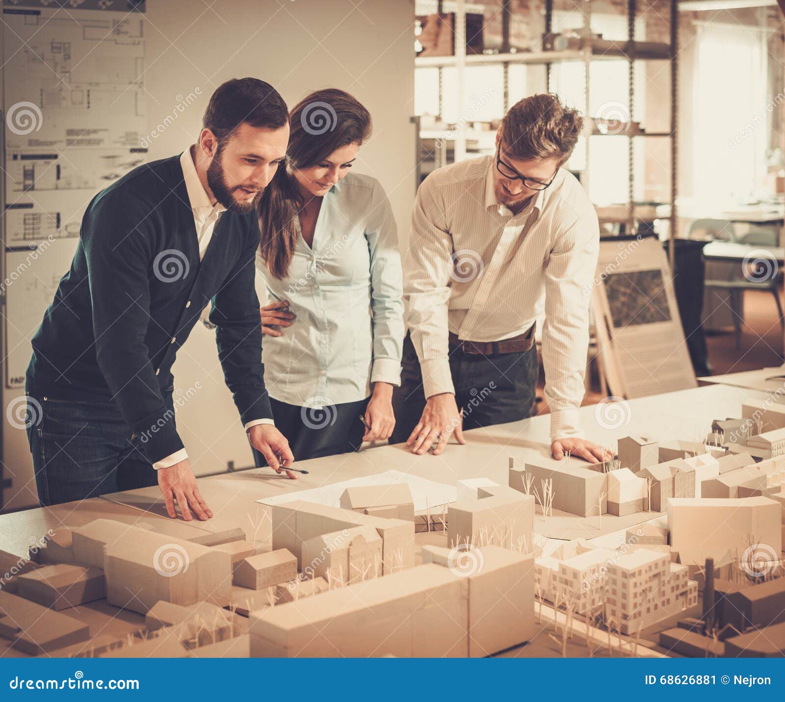 Confident Team of Engineers Working Together in a Architect Studio ...