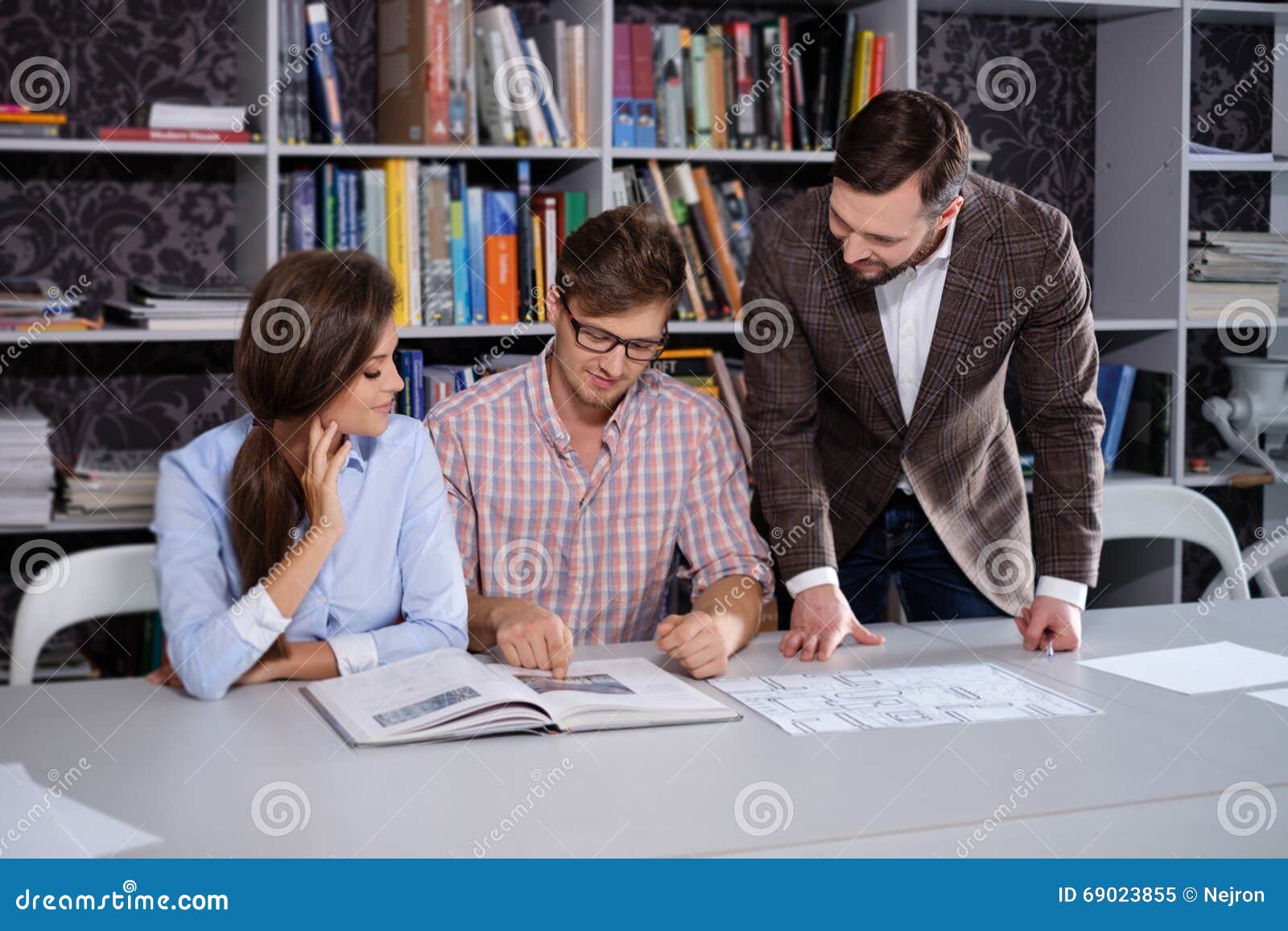 Confident Team of Engineers Working Together in a Architect Studio ...