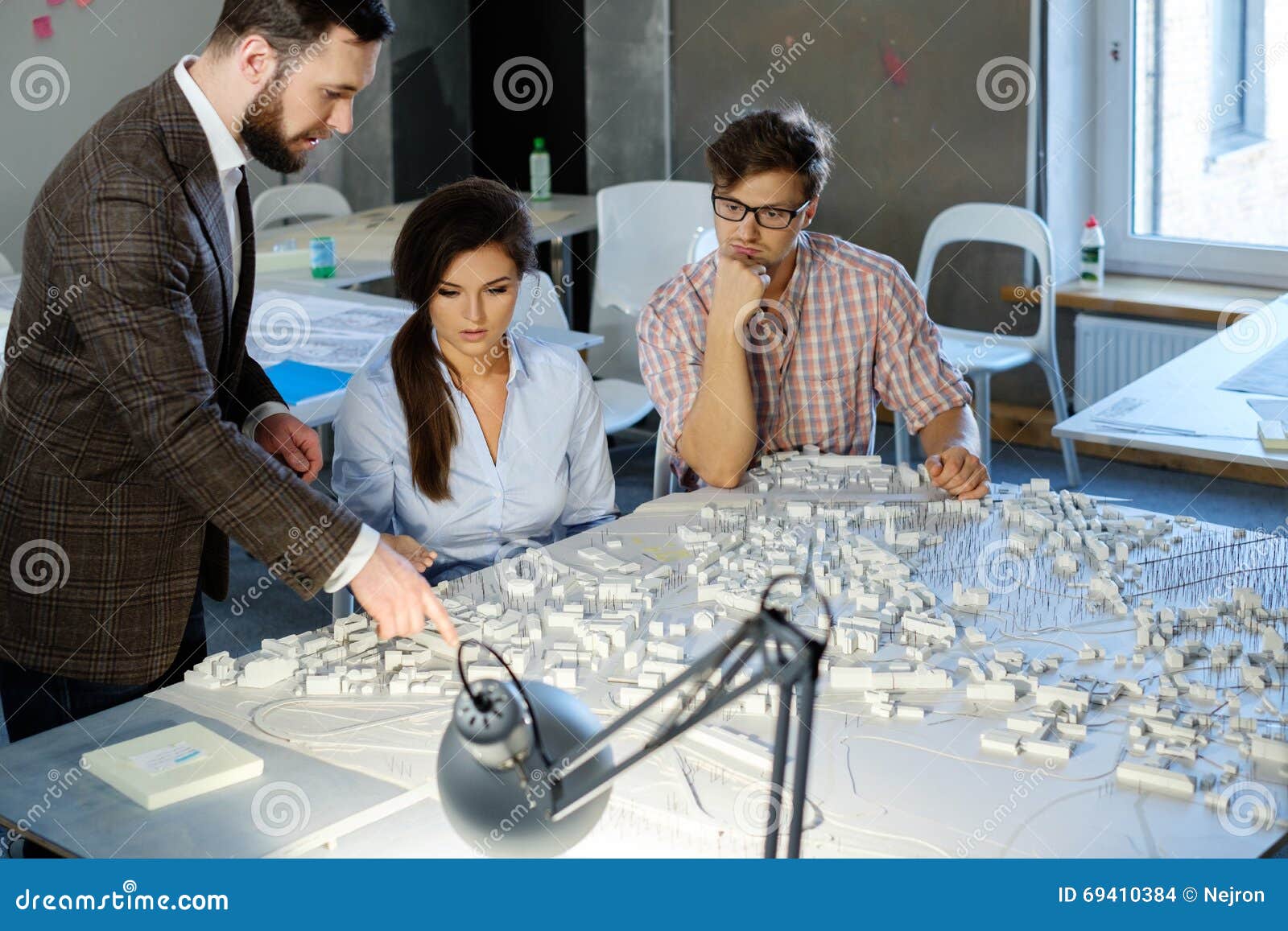 Confident Team of Engineers Working Together in a Architect Studio ...
