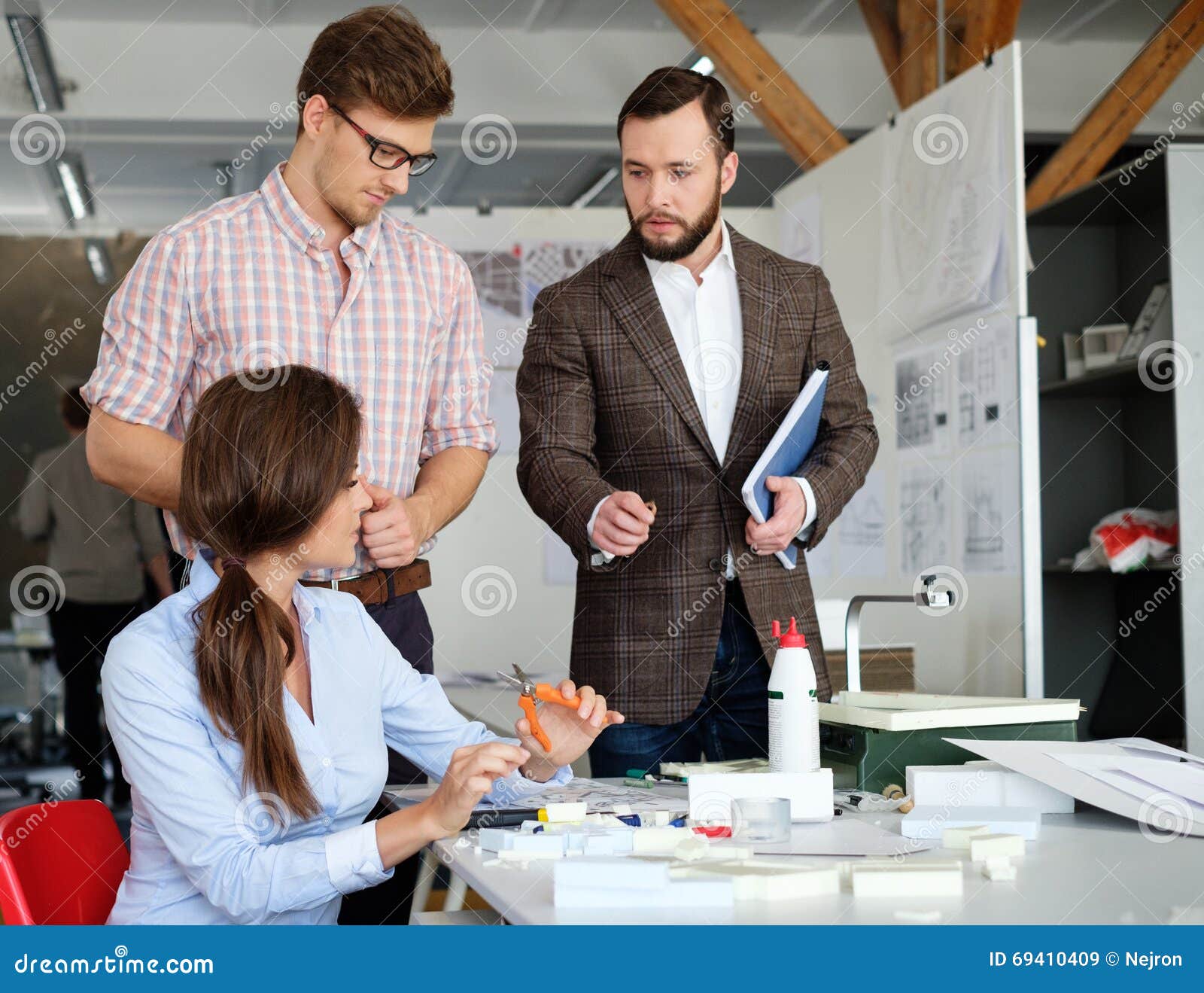 Confident Team of Engineers Working Together in a Architect Studio ...