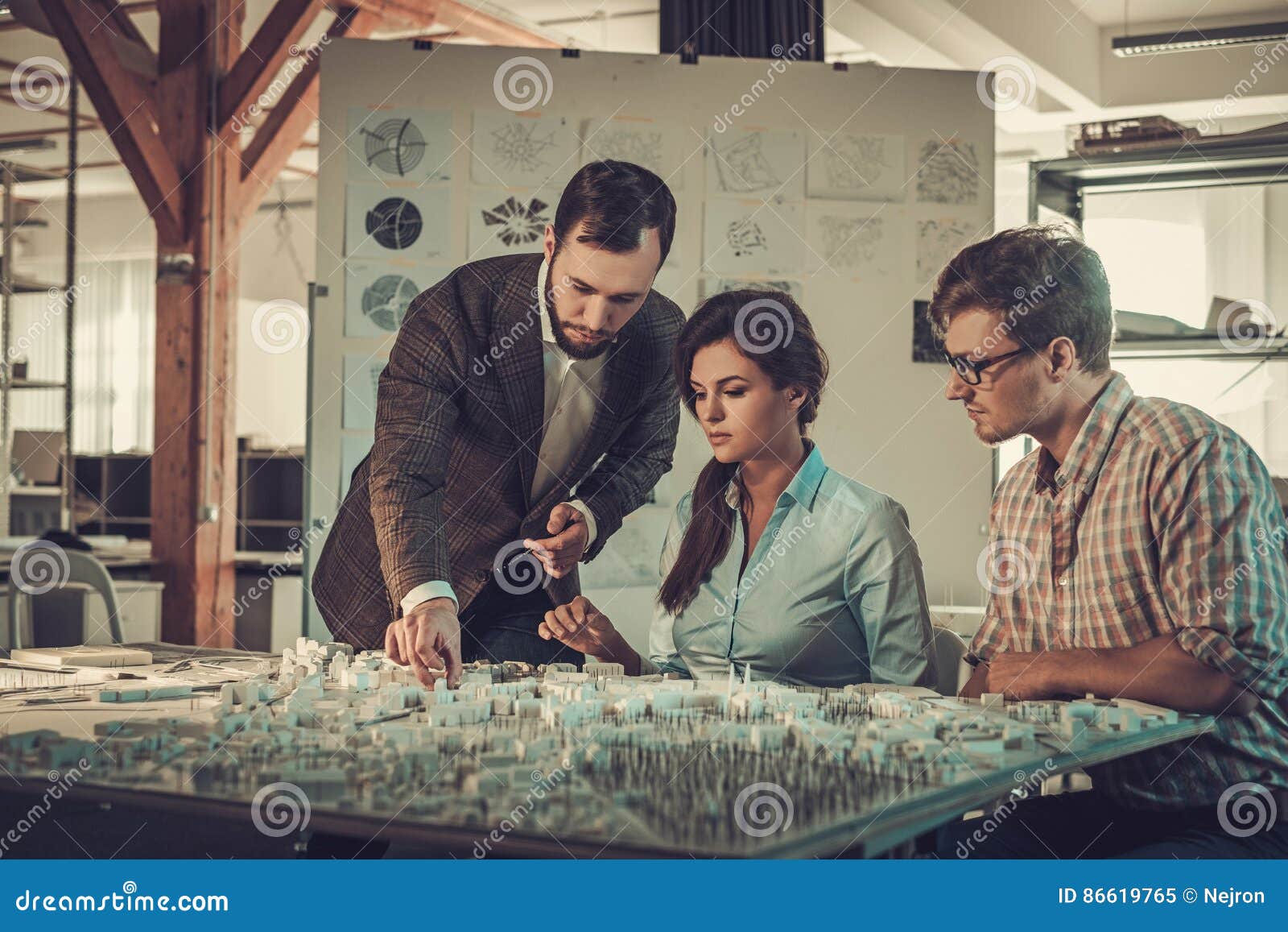 Confident Team of Engineers Working Together in a Architect Studio ...