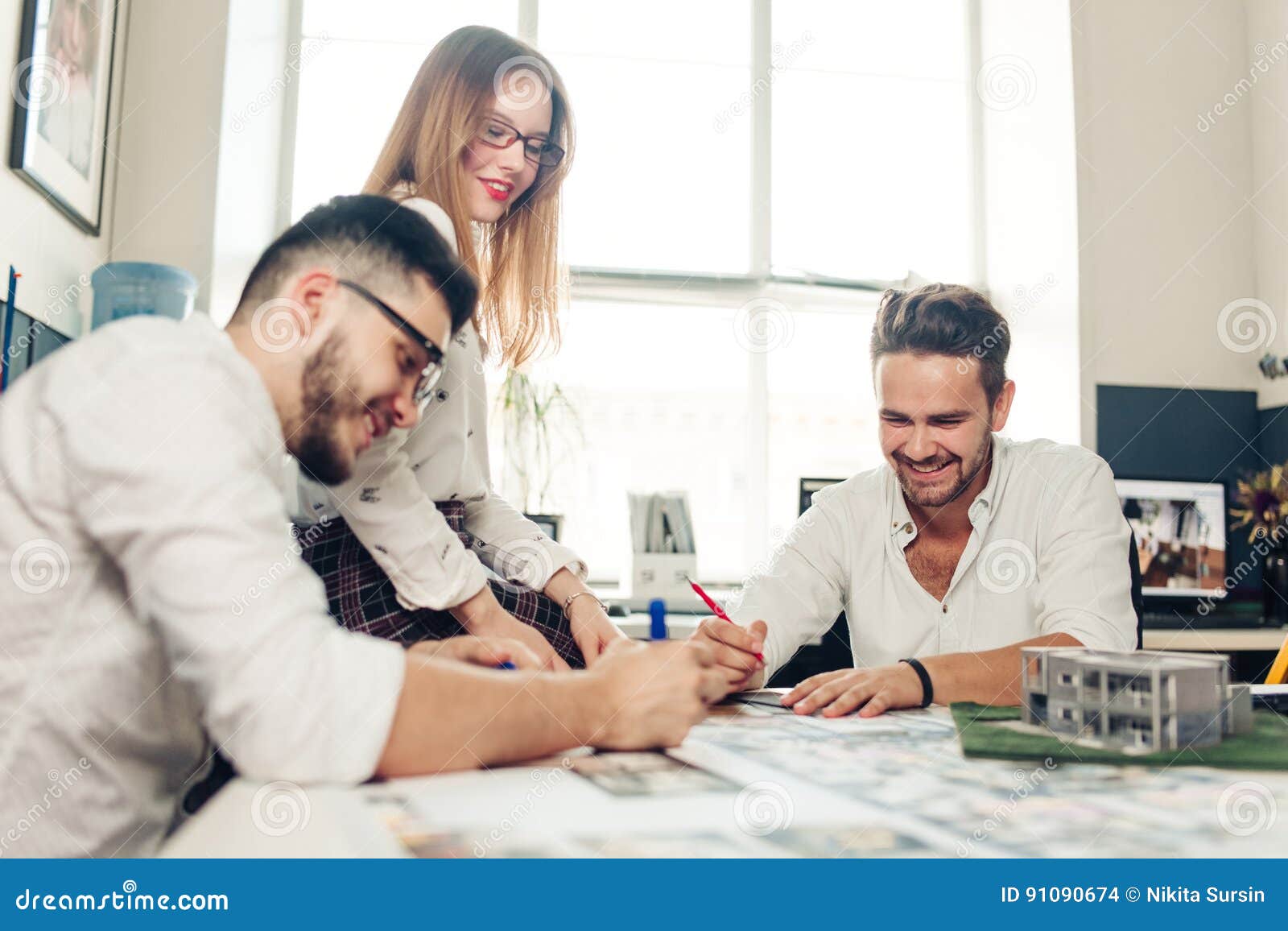 Confident Team of Engineers Working Together in a Architect Studio ...