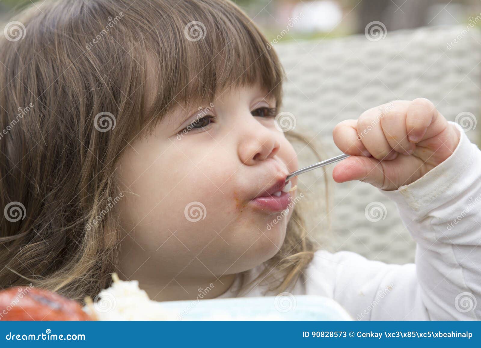 Confident Toddler Eating with Spoon Stock Image - Image of face, food ...