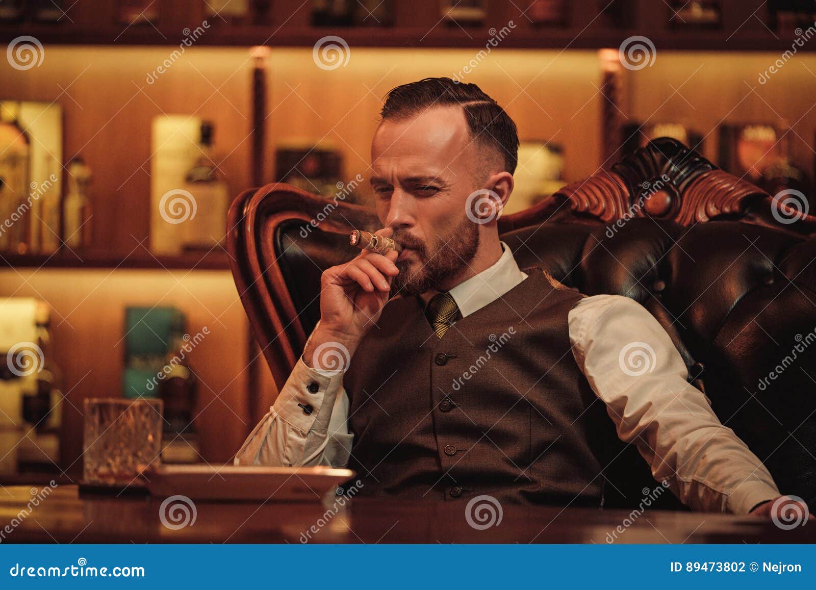 Confident Upper Class Man Smoking Cigar in Gentlemen`s Club Stock Photo ...