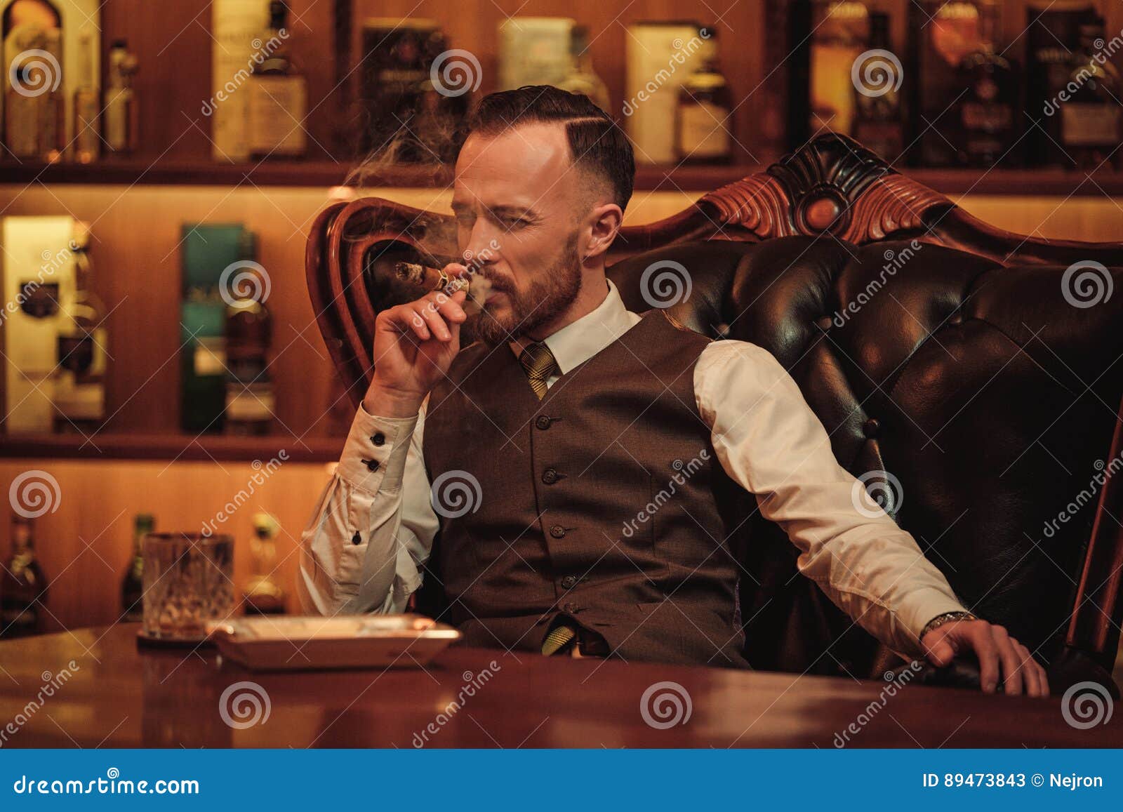 Confident Upper Class Man Smoking Cigar in Gentlemen`s Club Stock Image ...