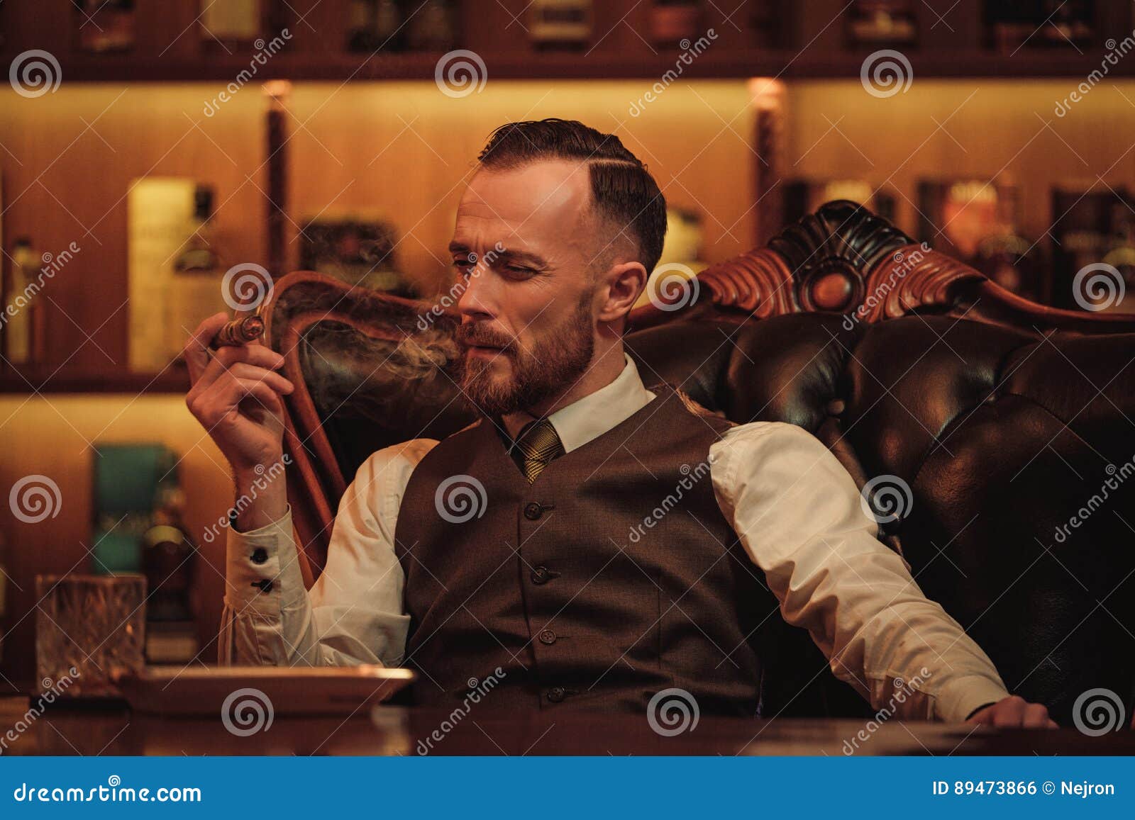 Confident Upper Class Man Smoking Cigar in Gentlemen`s Club Stock Photo ...