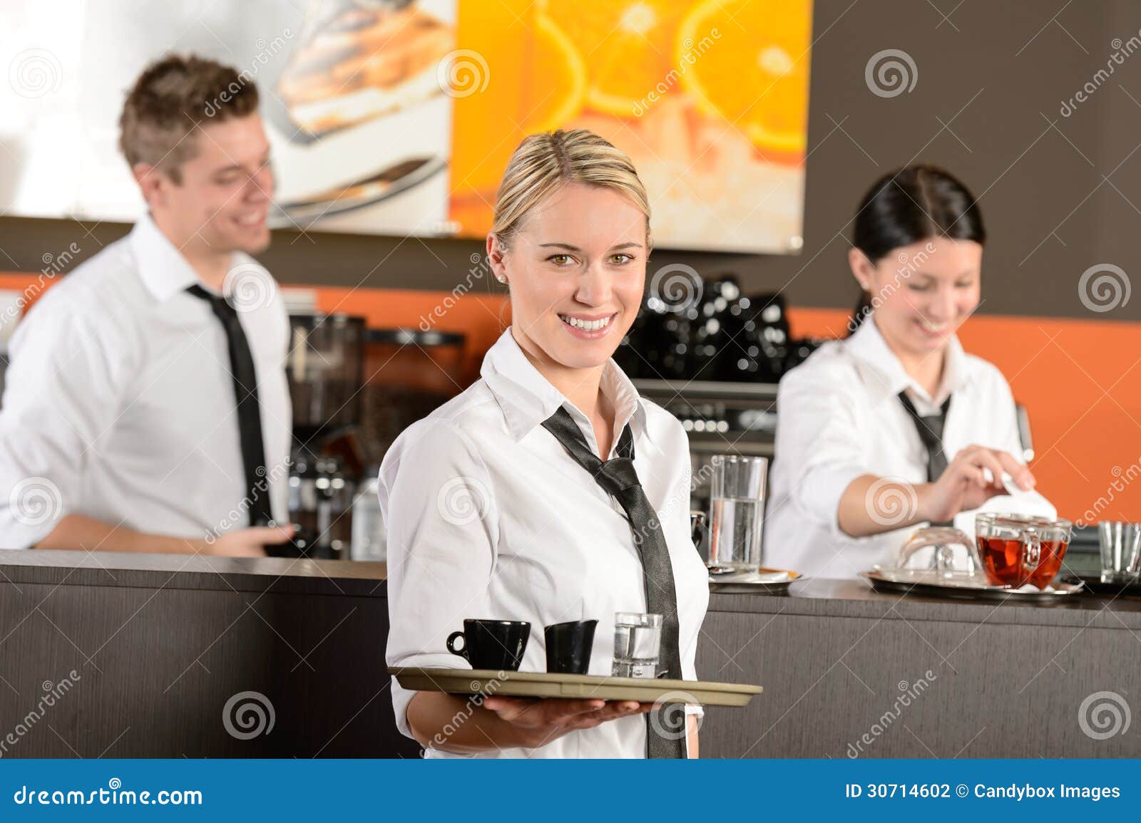Confident Waitress Serving Coffee with Tray Stock Photo - Image of ...