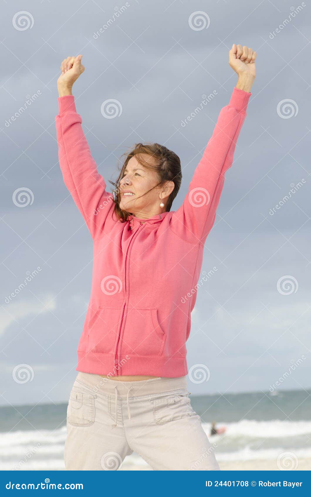 Confident Woman in Winning Pose at Beach Stock Photo - Image of ...