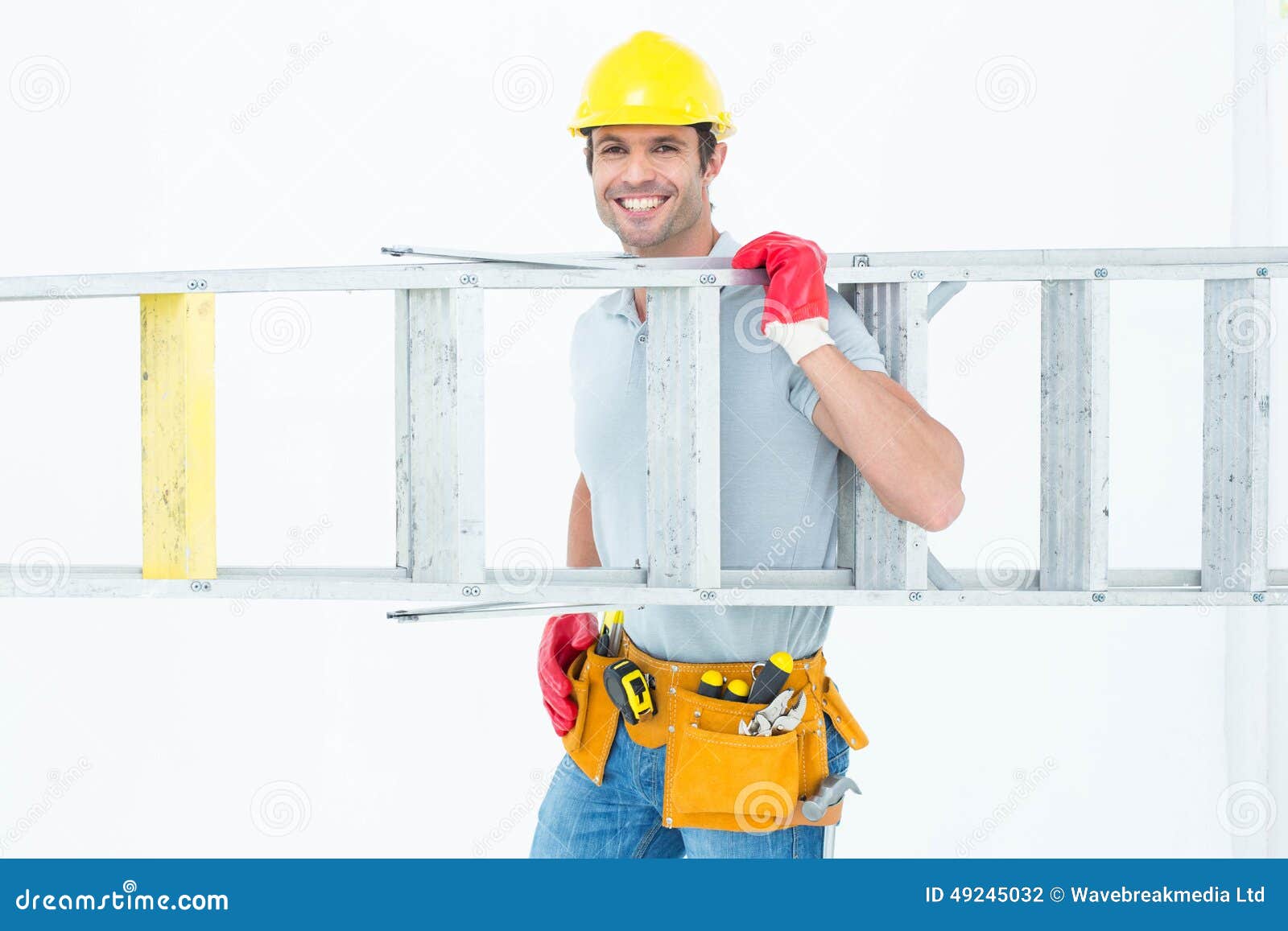 Confident Worker Carrying Step Ladder Stock Photo - Image of gloves ...