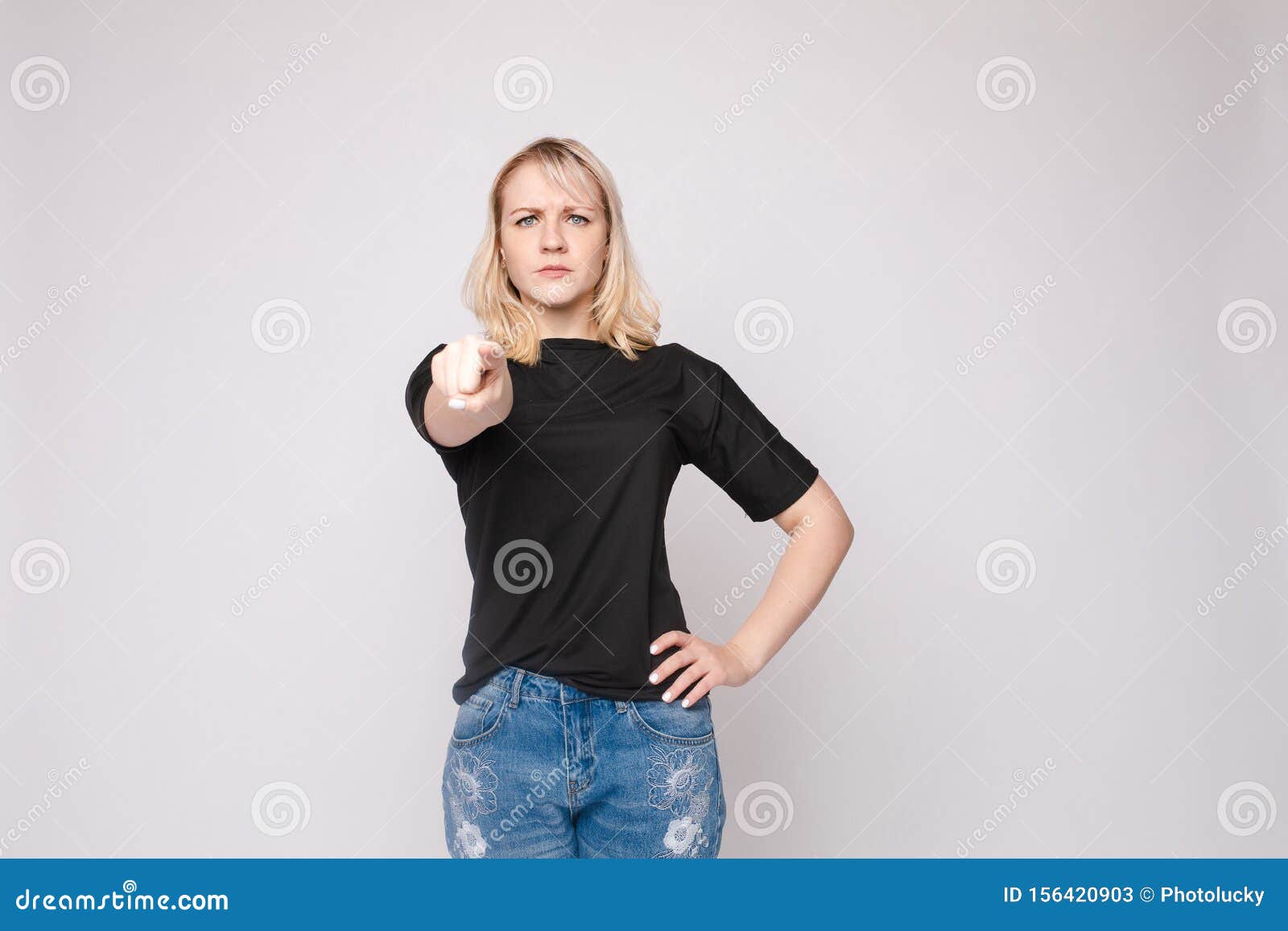 Confident Young Beautiful Woman Showing by Hand Stringent Looking at ...