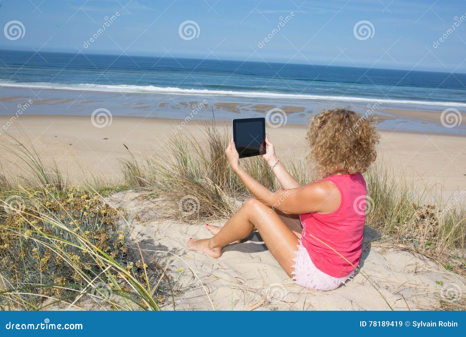 Confident Young Blond Woman Make Selfie at the Beach. Stock Image ...