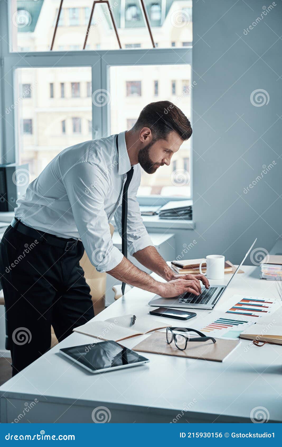Confident young man stock photo. Image of expertise - 215930156