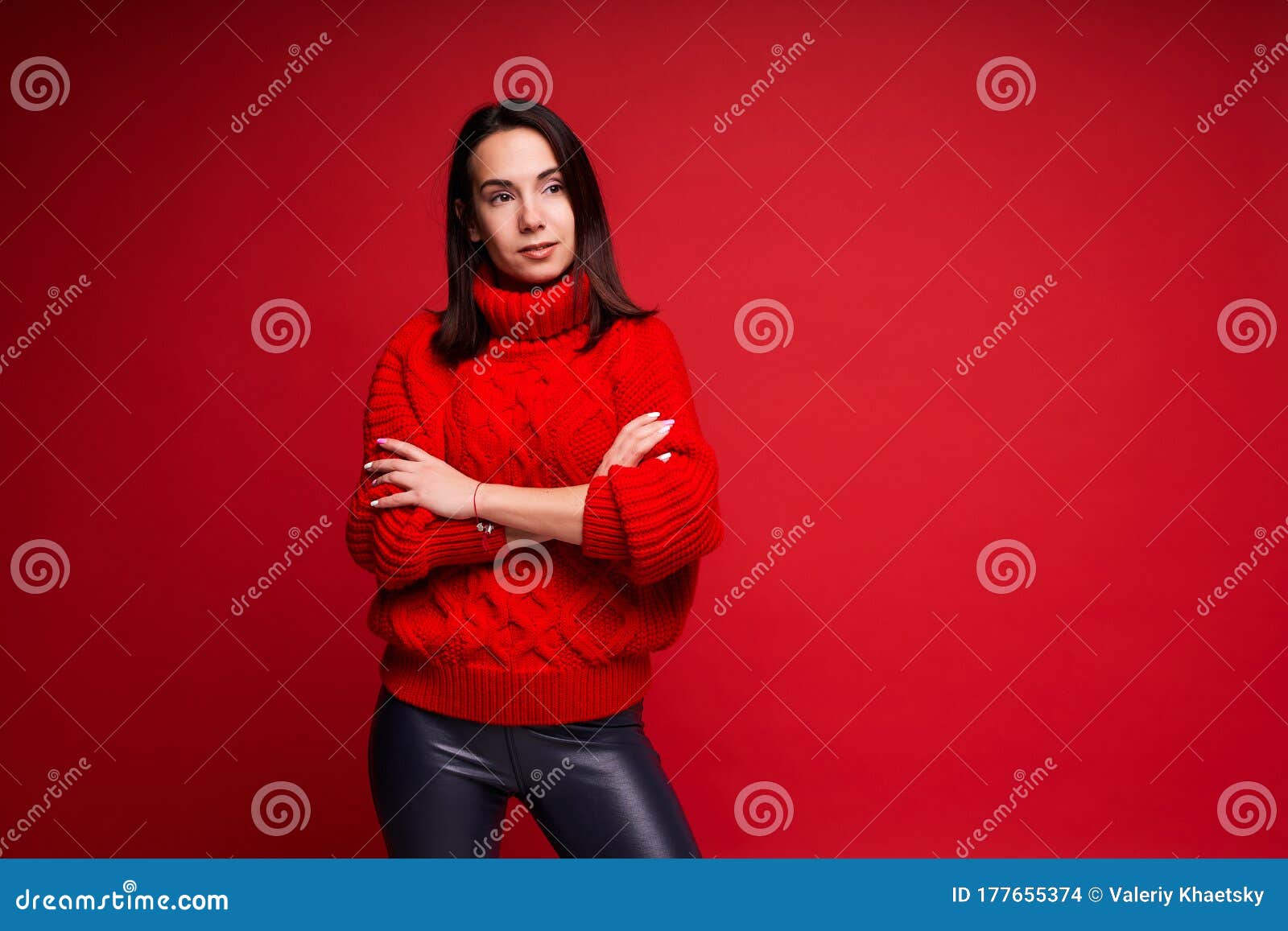 Confident Young Woman Looking Forward on Red Background Stock Photo ...